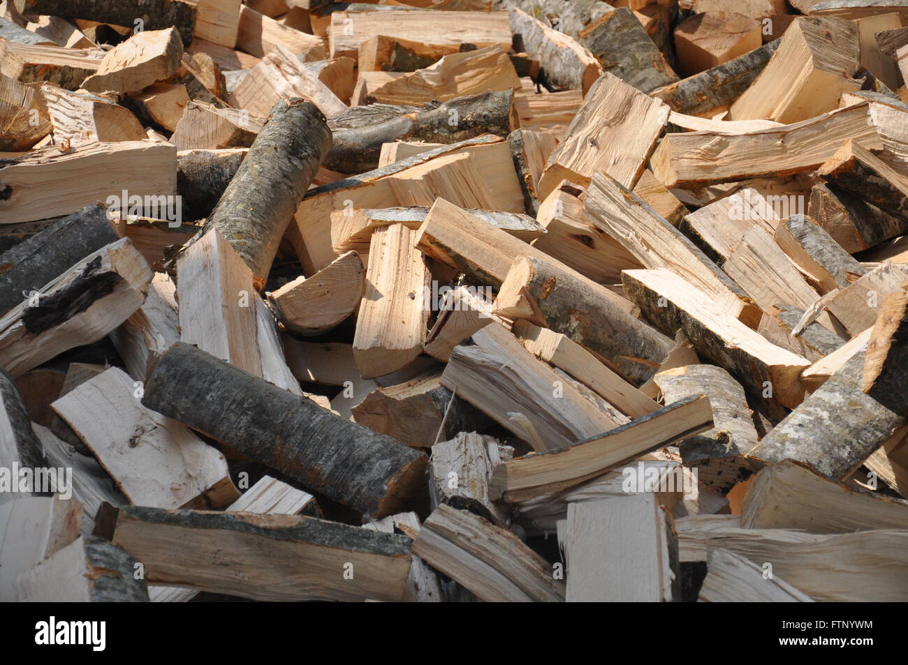 Many rows of timber are stacked high at a sawmill Stock Photo - Alamy