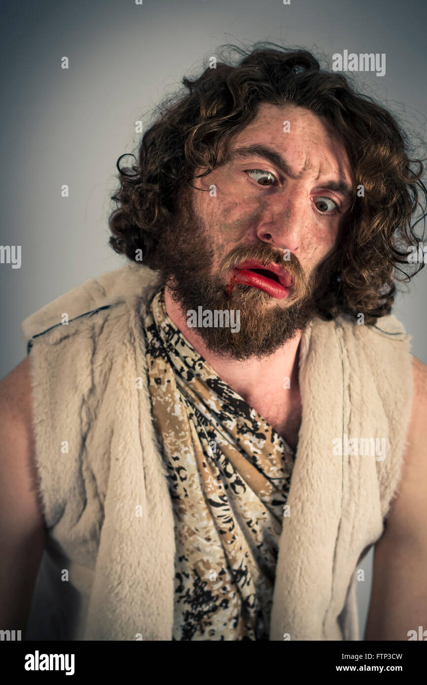 Silly realistic caveman with Stock Photo - Alamy