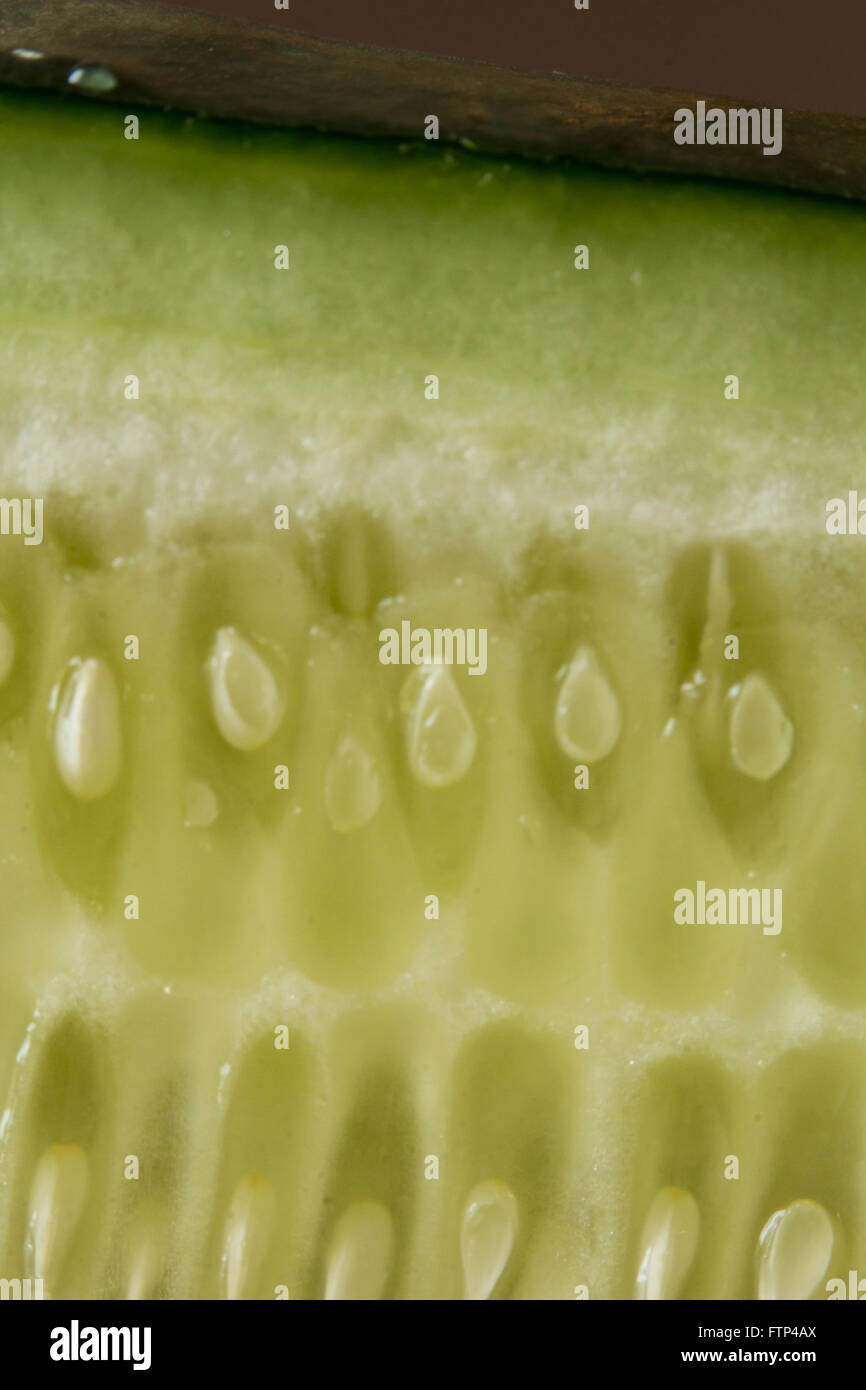 Extreme macro close up cucumber sliced lengthwise with seeds Stock ...