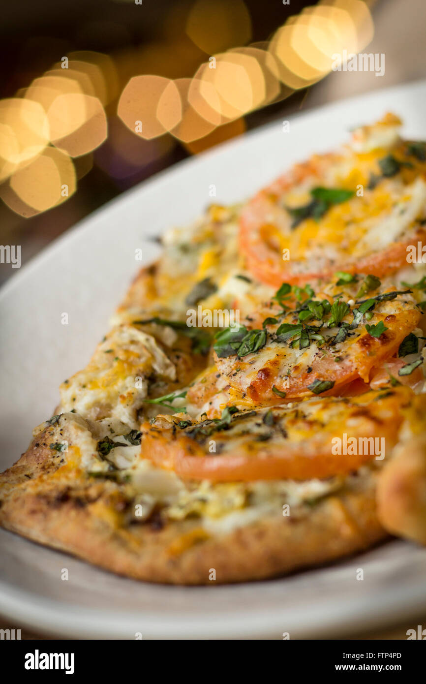 Personal size flatbread authentic margherita pizza with fresh tomatoes ...