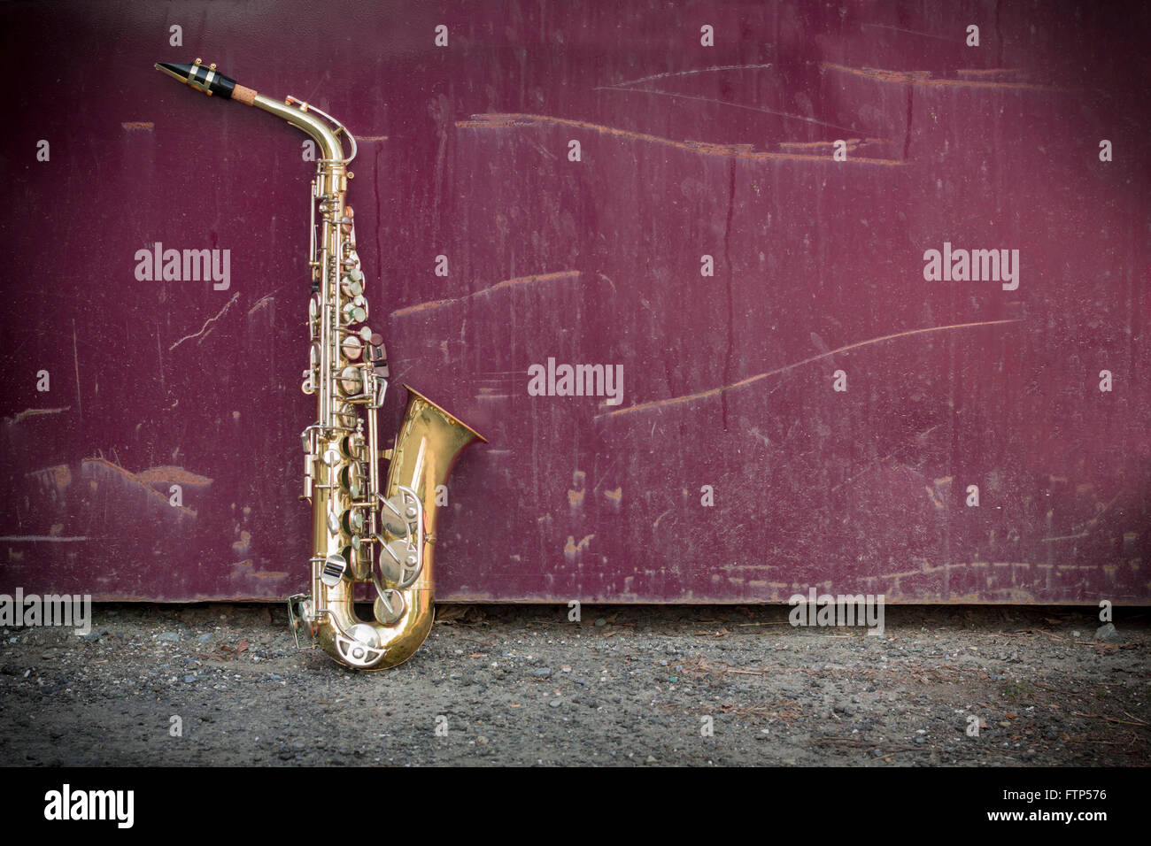 Jazz musical instrument saxophone with grungy street background Stock ...