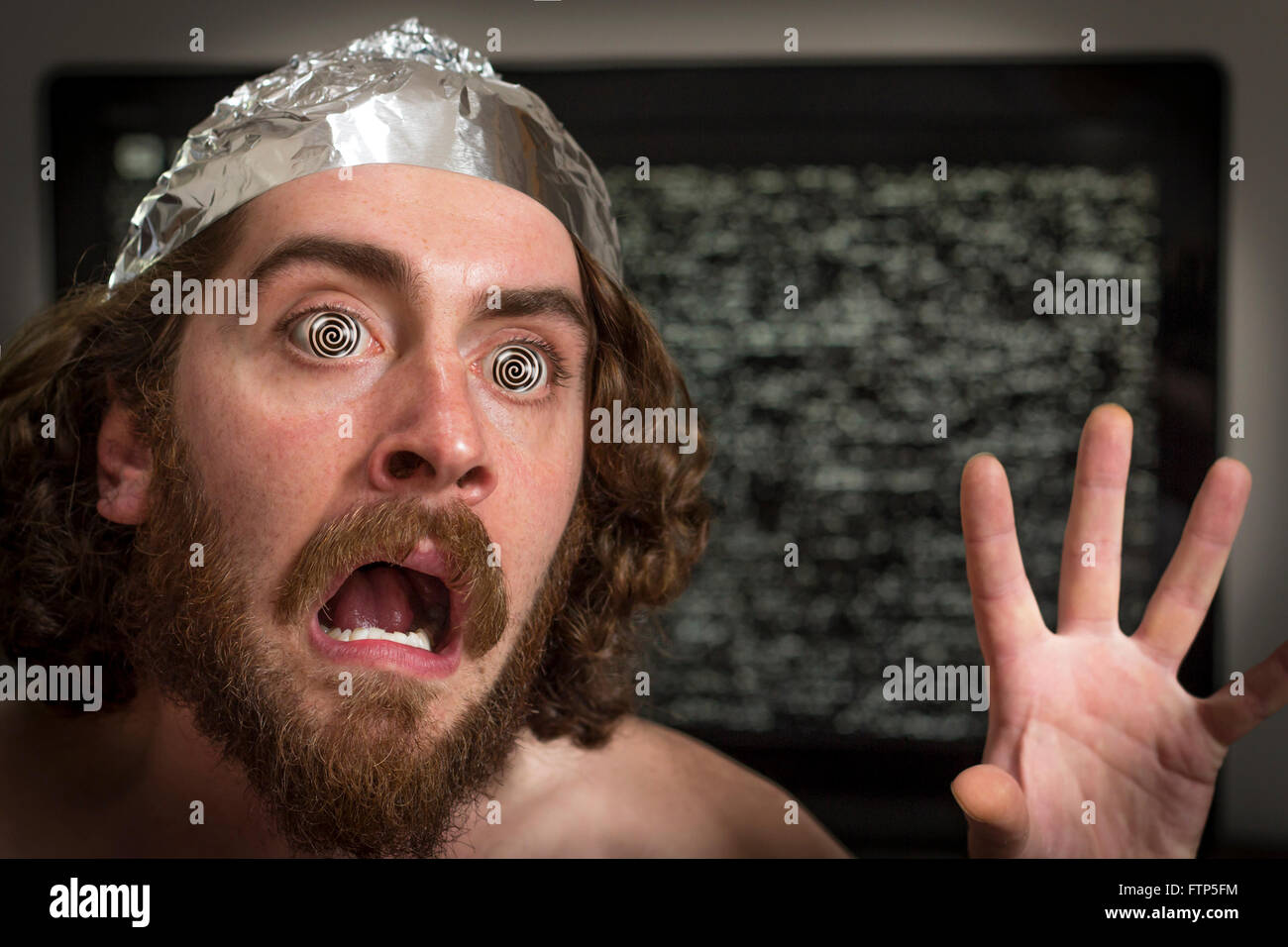 Brain washed crazy man is hypnotized by television program Stock Photo ...
