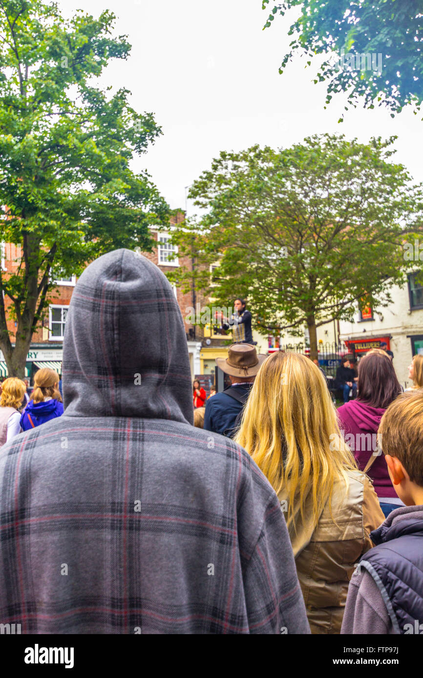 Tourists watching street performance in York, England, United Kingdom ...