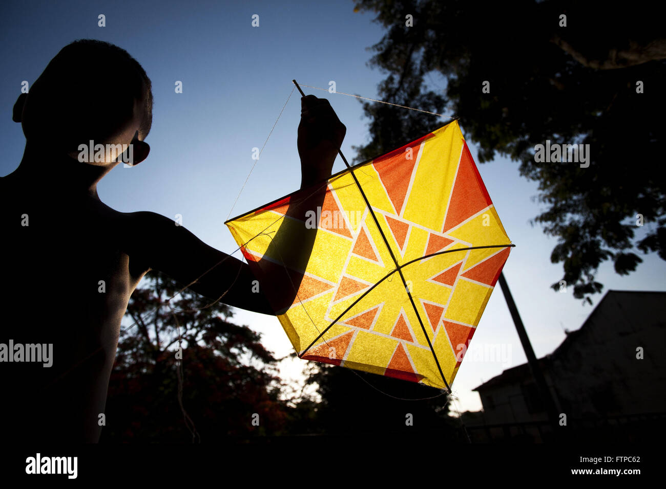 Boy flying a kite in the Santa Teresa neighborhood in the city of Rio ...