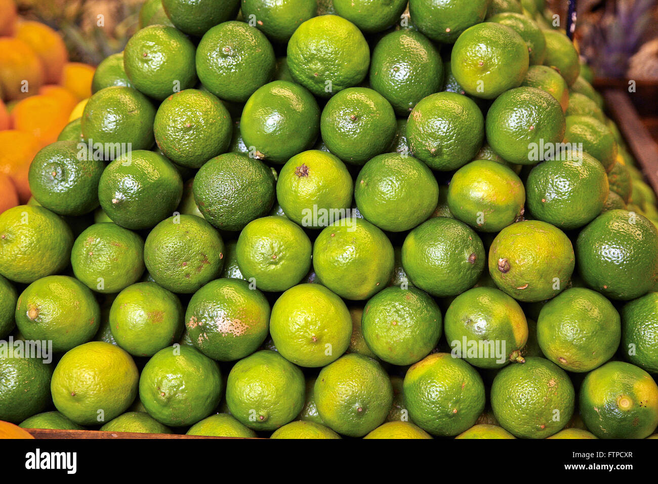 Tahiti lemon sale at supermarket Stock Photo - Alamy