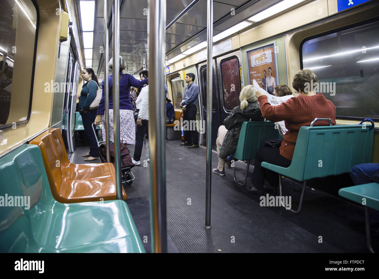 Passengers traveling in subway car Stock Photo - Alamy