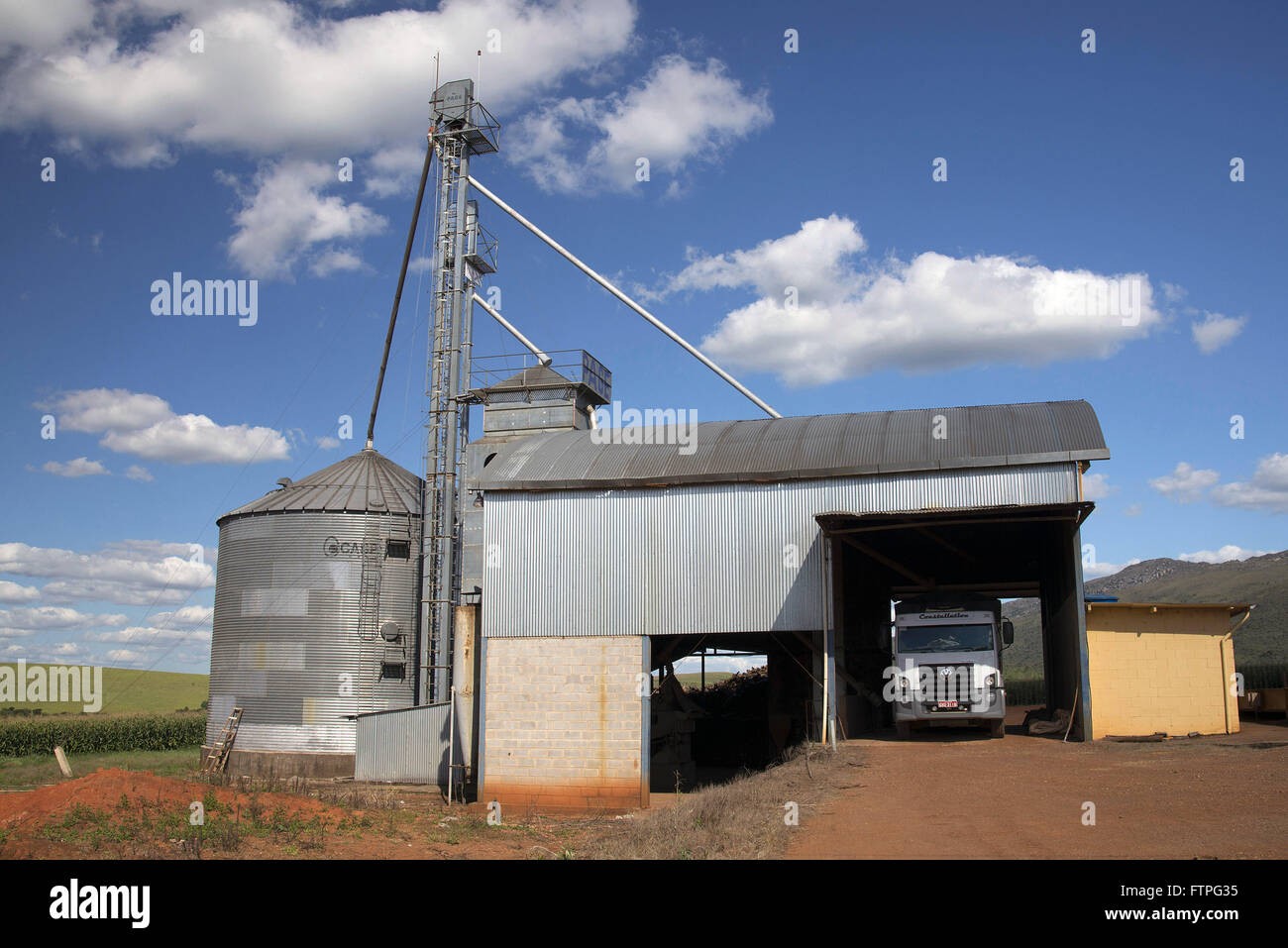 Local storage of grain in corn plantation in rural area Stock Photo - Alamy