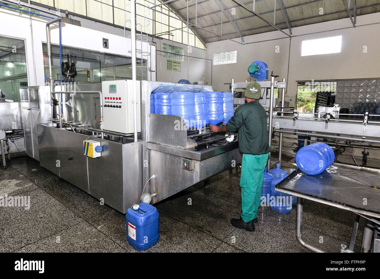Production line for mineral water bottling company Stock Photo - Alamy