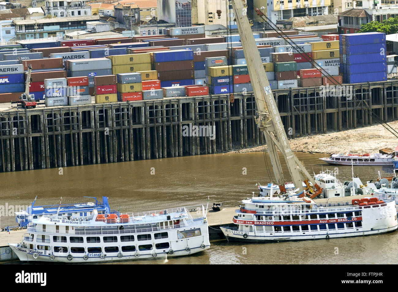 Cages in the Rio Negro and the cargo terminal of the Port Chibatao ...