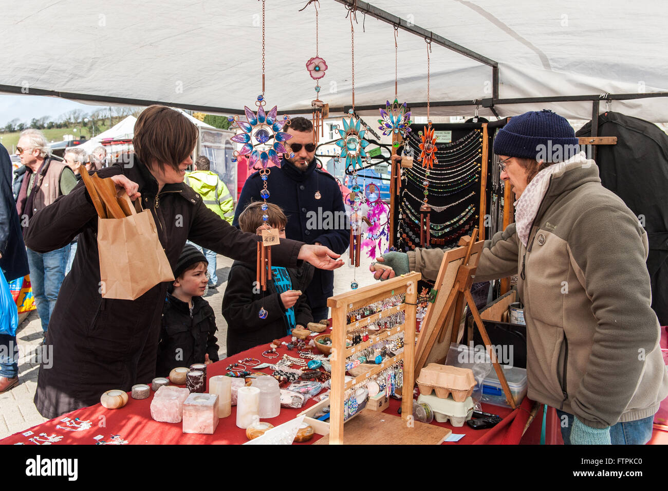 Customer buys a product from a stall at Bantry Market, Bantry, West ...