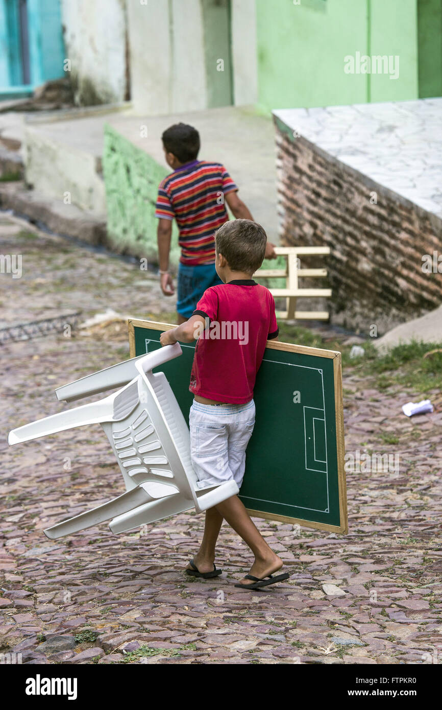Boy carrying table football table in the Colina do Horto Stock Photo ...