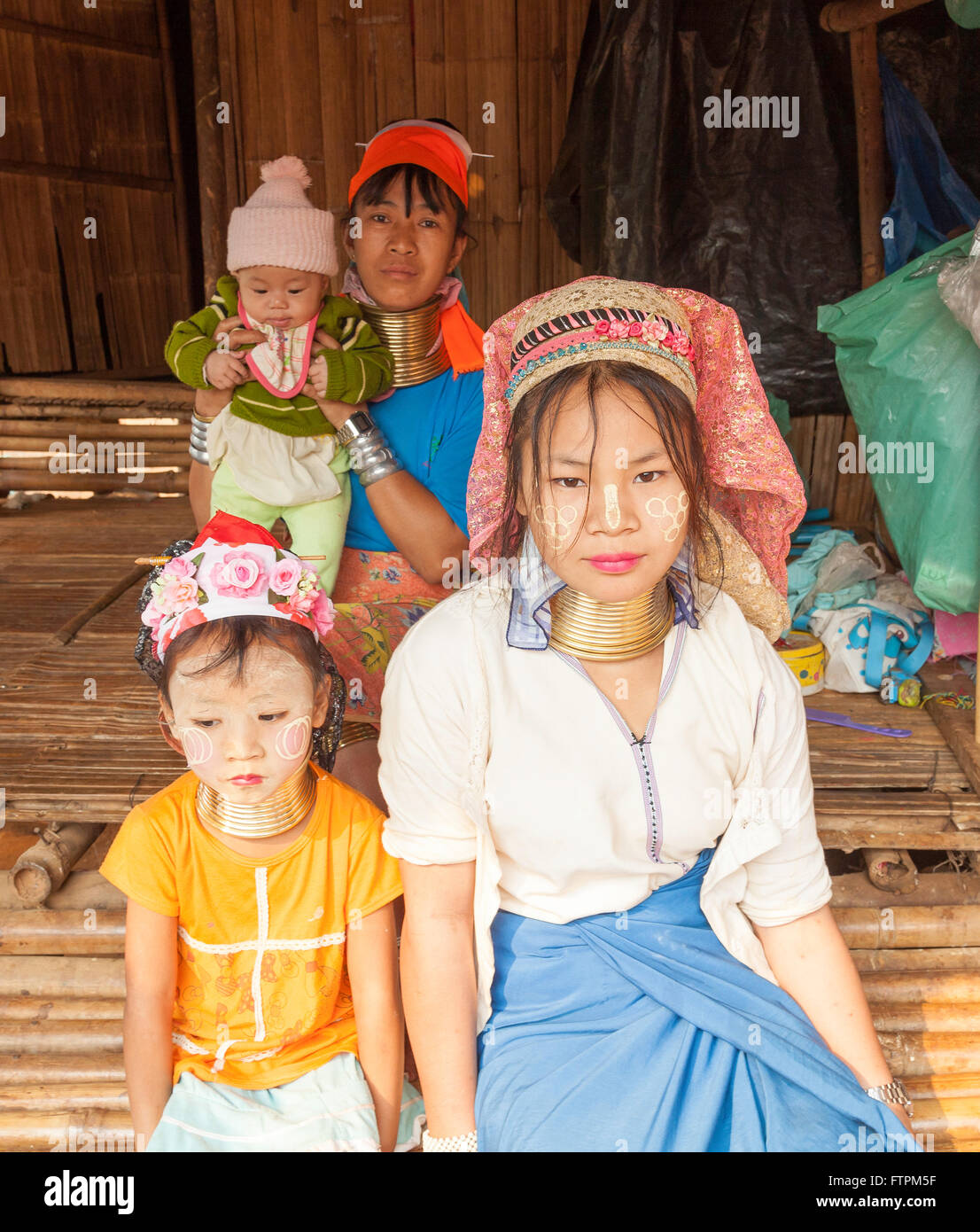 Family of 4 at the Hill Tribe of Northern Thailand the long neck people ...