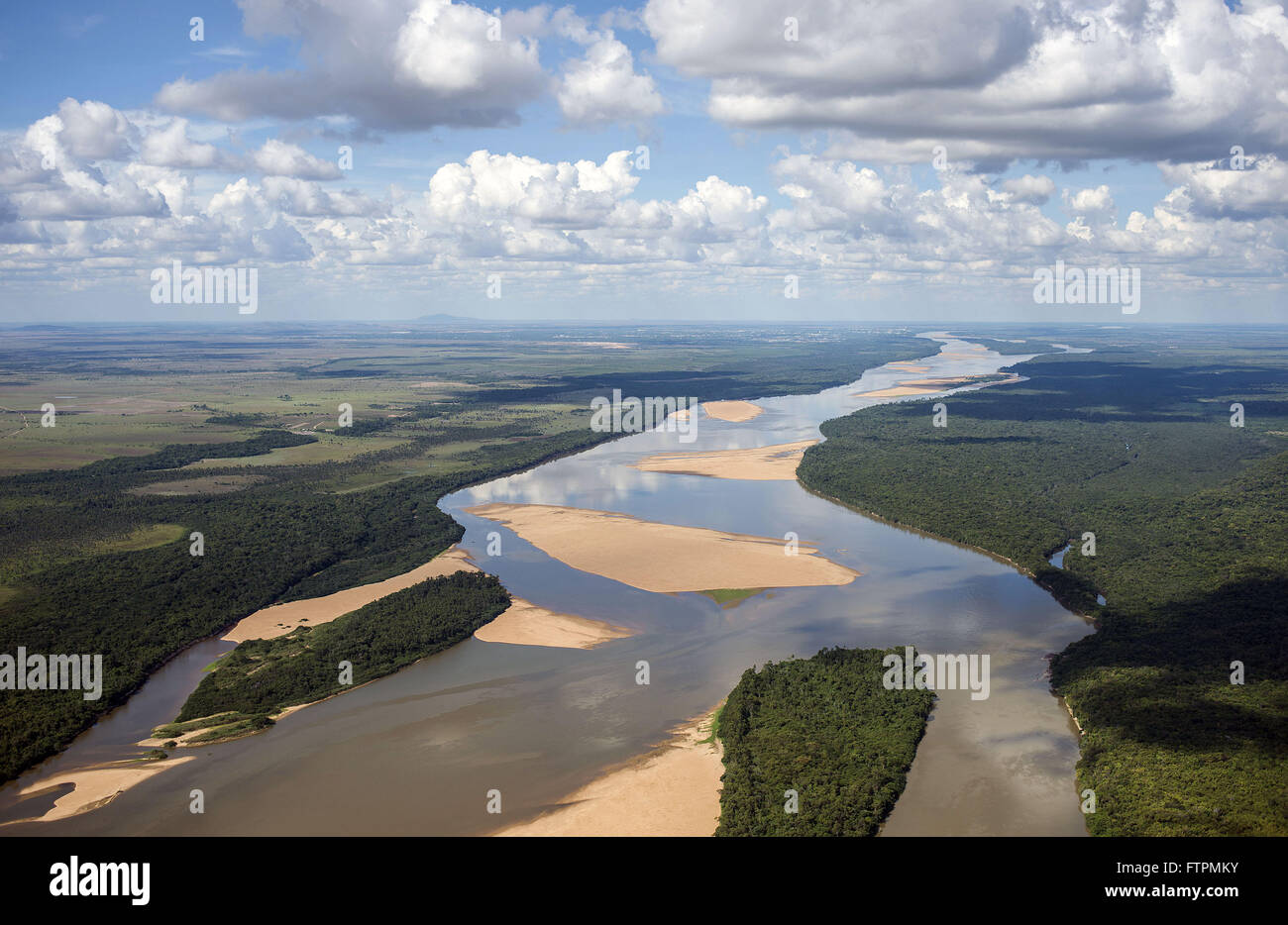 Aerial view of the Amazon forest with White River in the region of ...