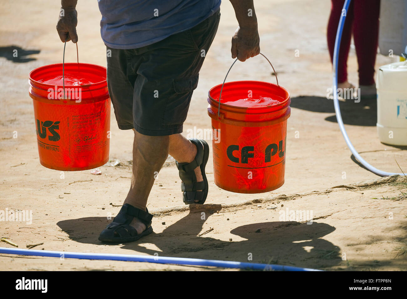 Resident buckets with water fueled by reservoir installed on plaza ...
