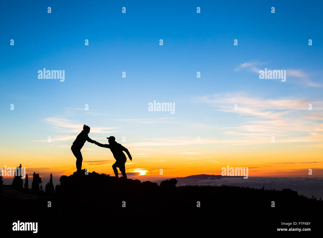 Helping hand silhouette hi-res stock photography and images - Alamy