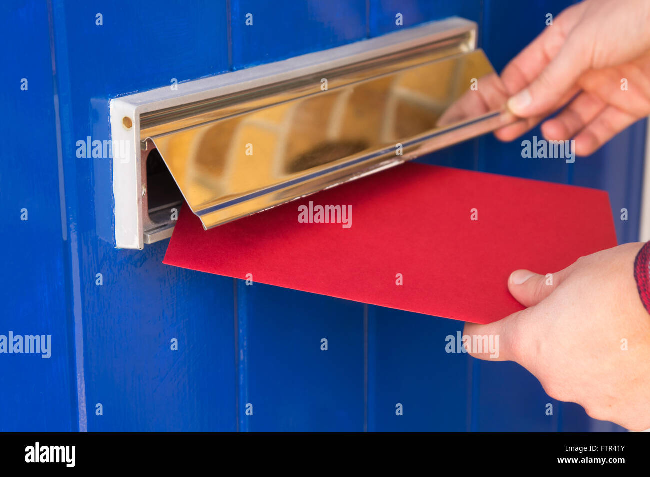 Posting a letter Stock Photo - Alamy