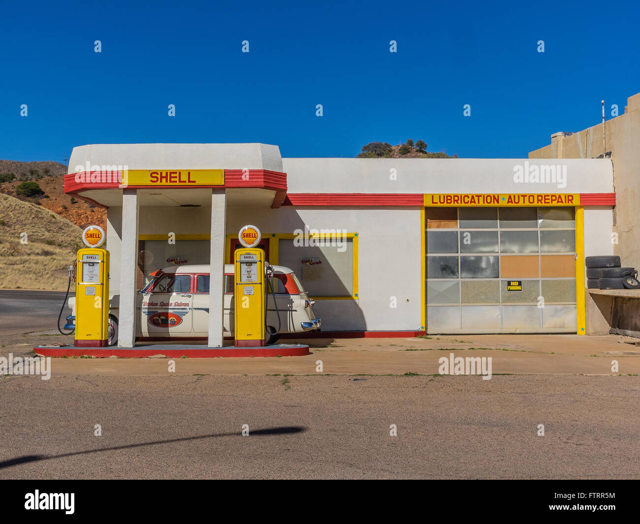 Classic 1950s Shell Gas Station painted yellow and red in Shell's ...