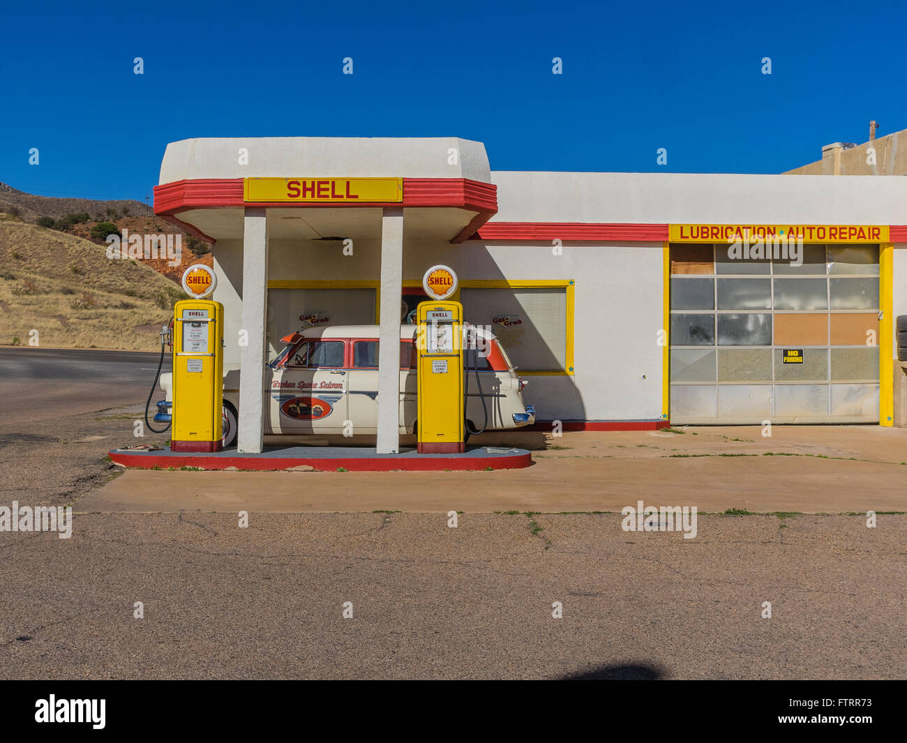 Classic 1950s Shell Gas Station painted yellow and red in Shell's ...