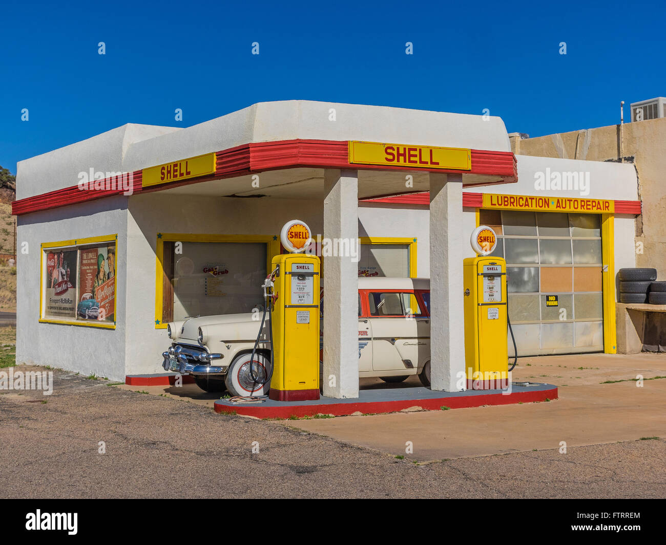 Classic 1950s Shell Gas Station painted yellow and red in Shell's ...