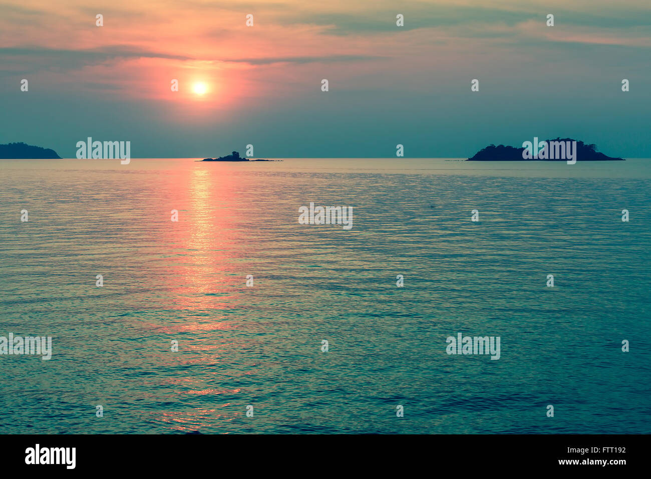 Beautiful surreal sunset on the sea coast Stock Photo - Alamy