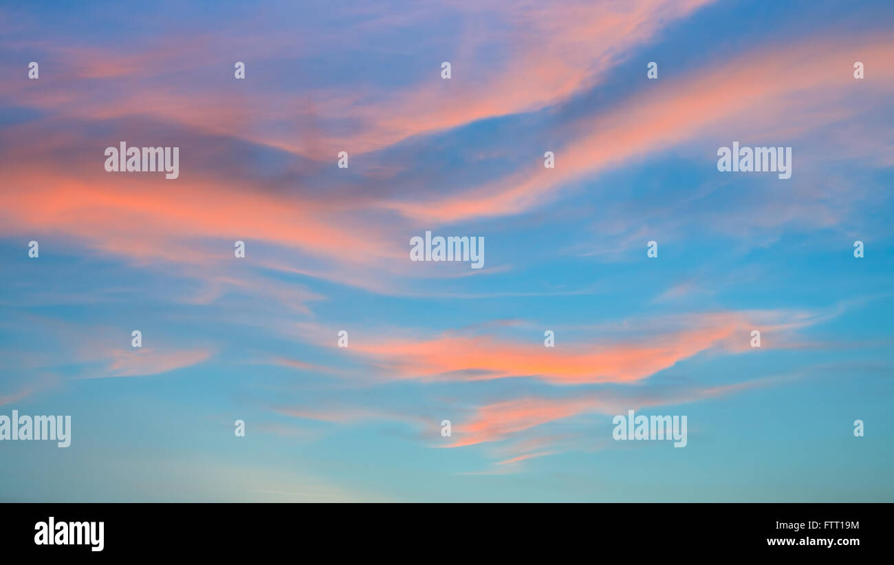Blue sky with clouds during sunset Stock Photo - Alamy