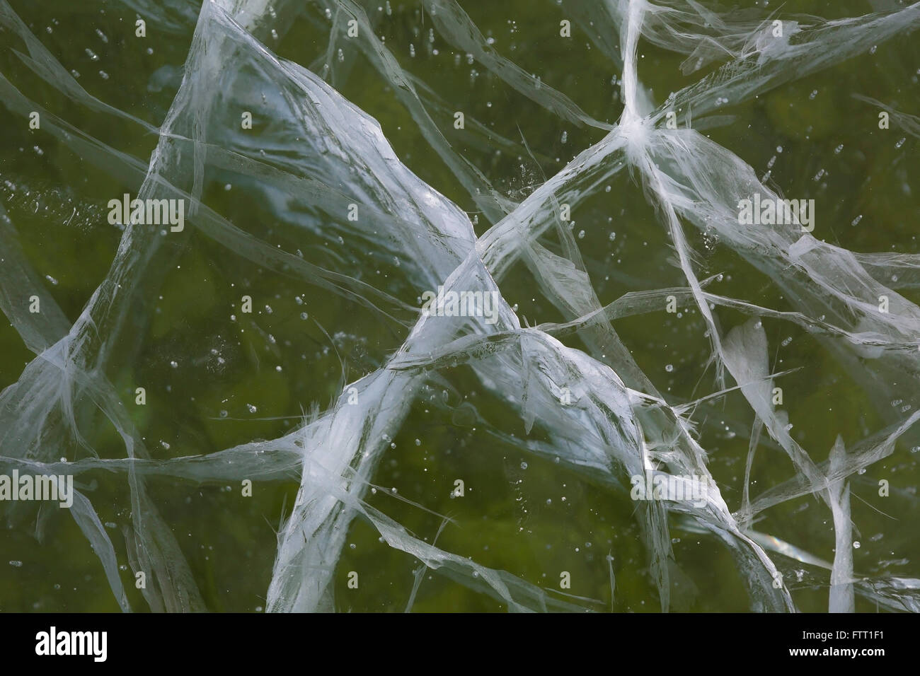 Cracks in transparent ice hi-res stock photography and images - Alamy