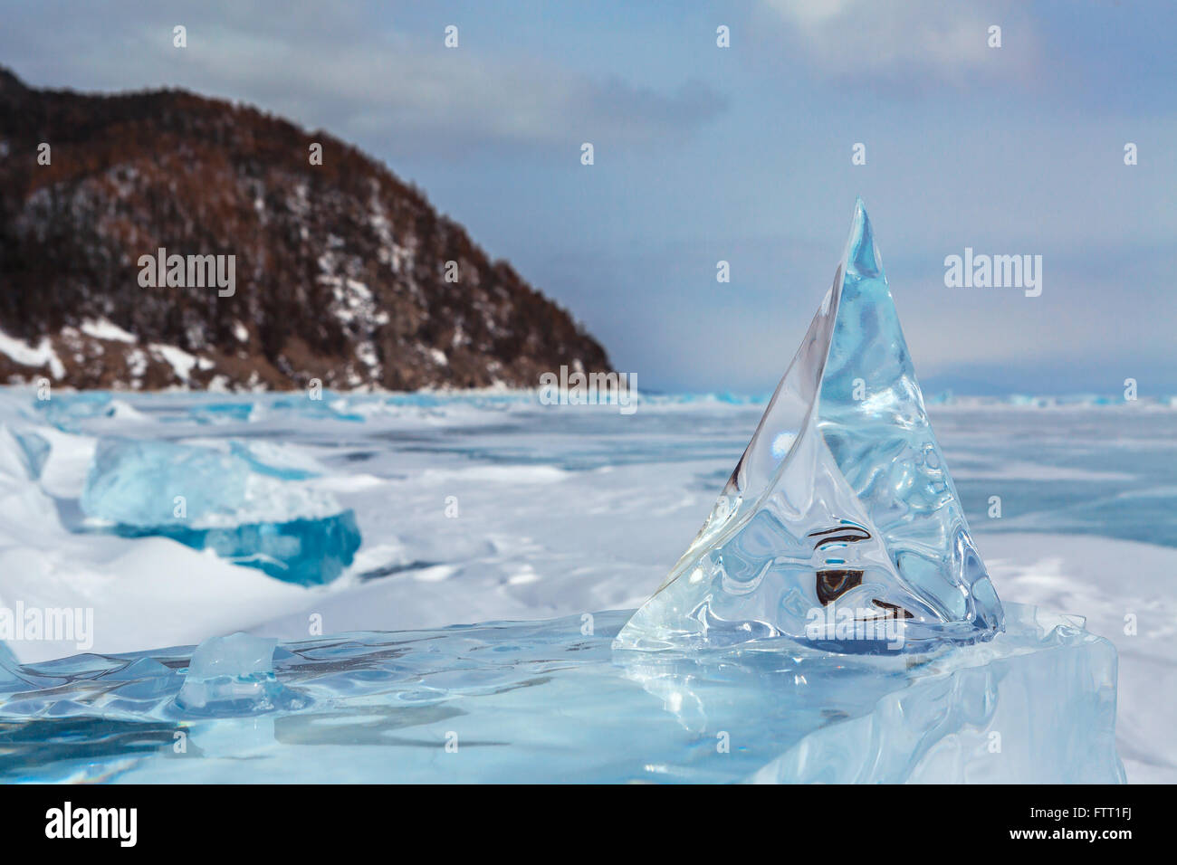 Beautiful transparent block of ice Stock Photo - Alamy