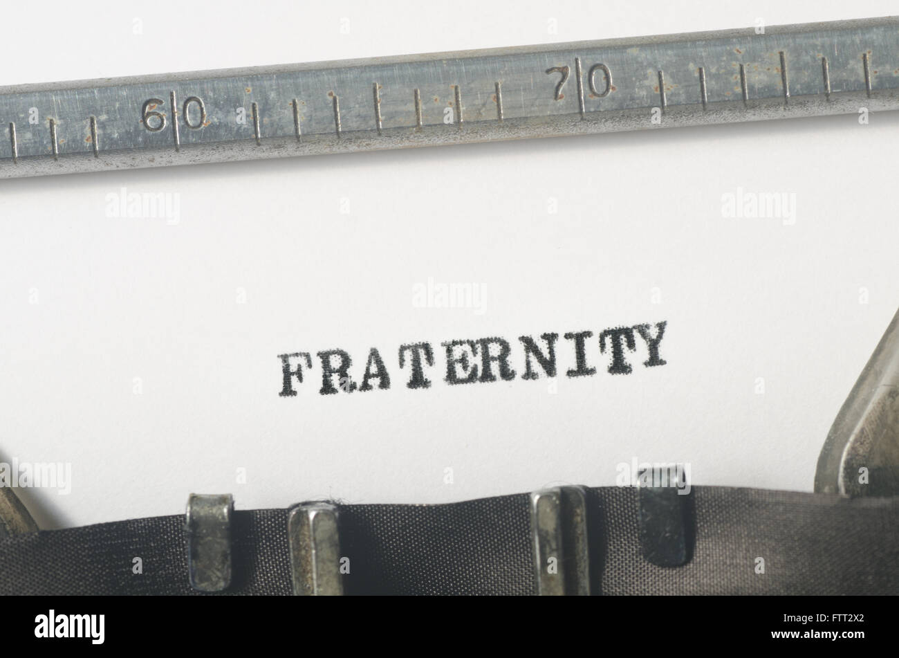 Word fraternity typed on an old typewriter Stock Photo - Alamy