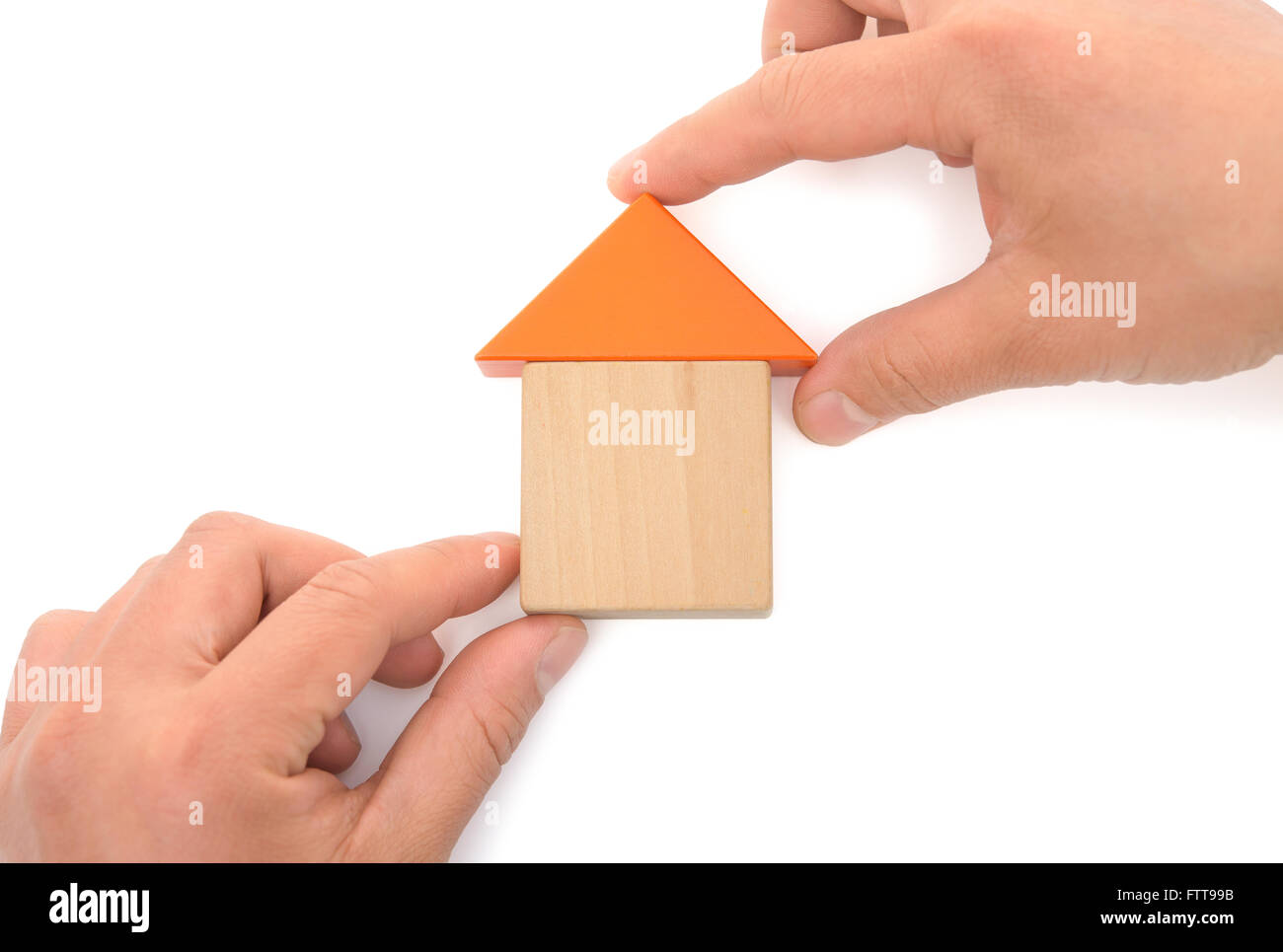 hands making up a house on white with clipping path Stock Photo - Alamy