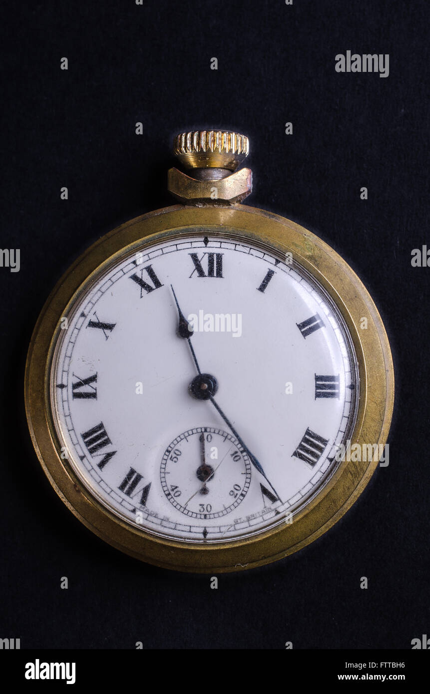 vintage gentleman's fob watch on plain black background Stock Photo - Alamy