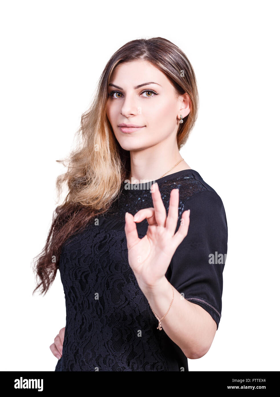 Young beautiful woman shows OK sign Stock Photo - Alamy