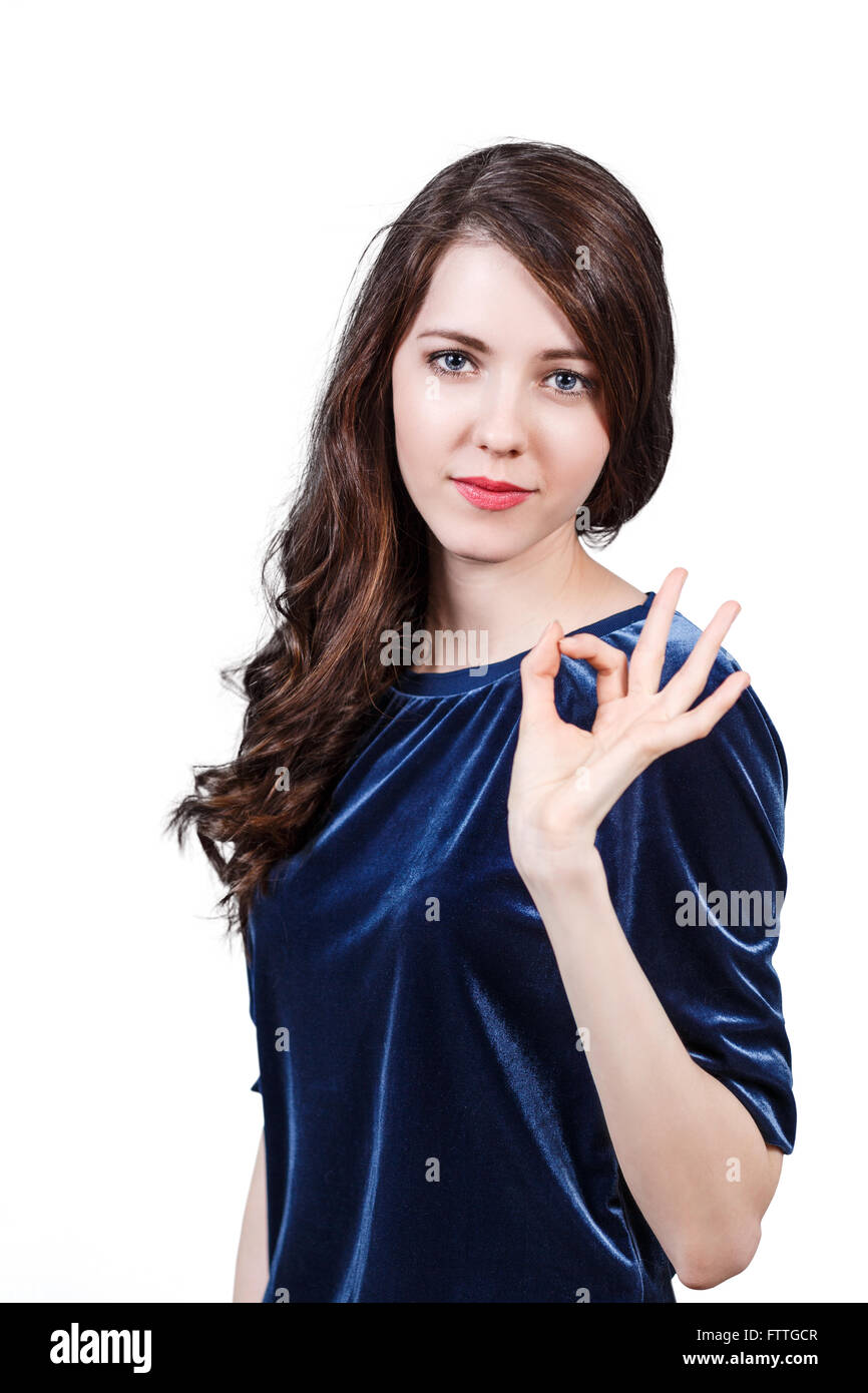 Young beautiful woman shows OK sign Stock Photo - Alamy