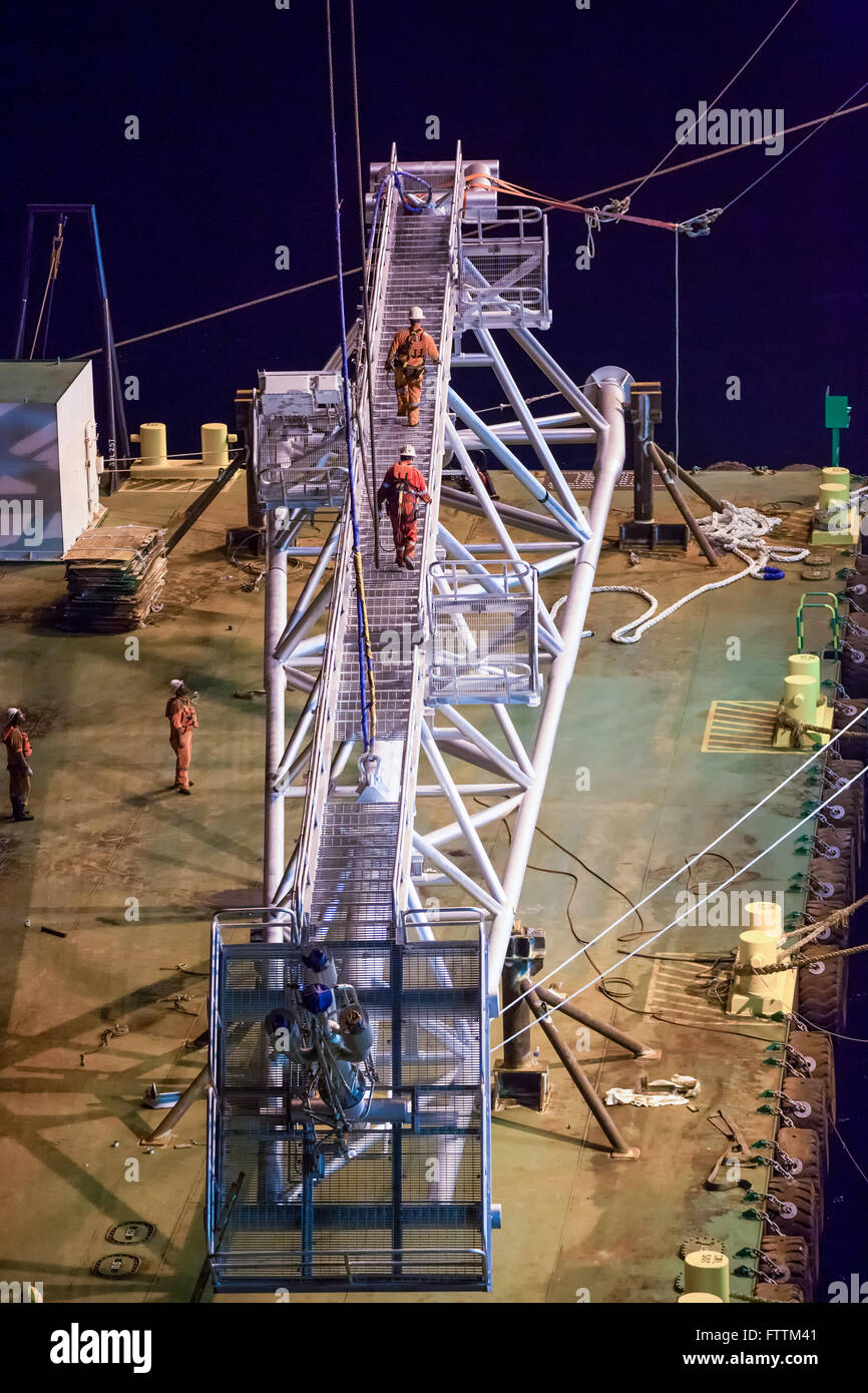Oil torch installation on oil rig Stock Photo - Alamy
