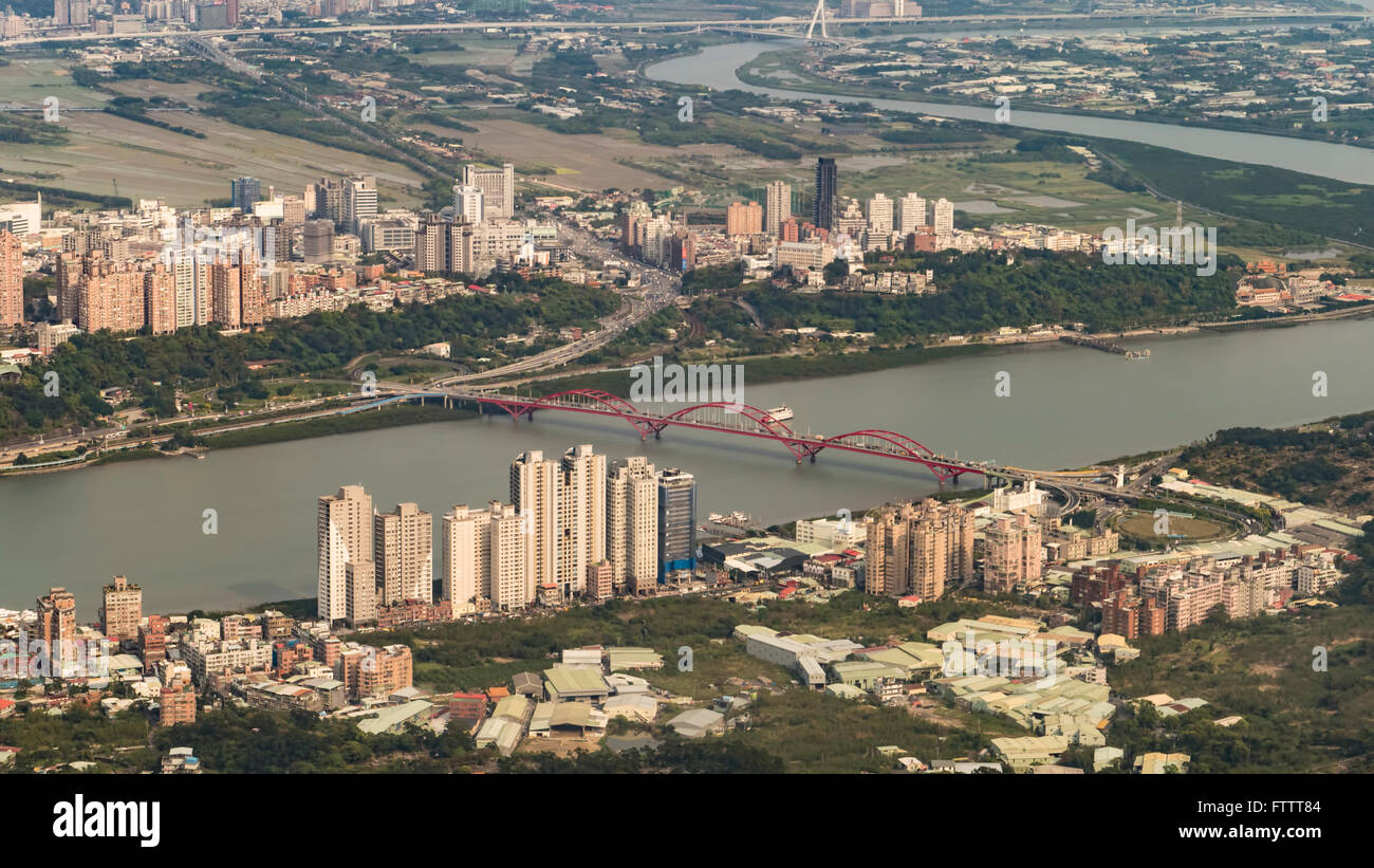 The Scenery of Tamsui river with famous Guandu Bridge far away in ...