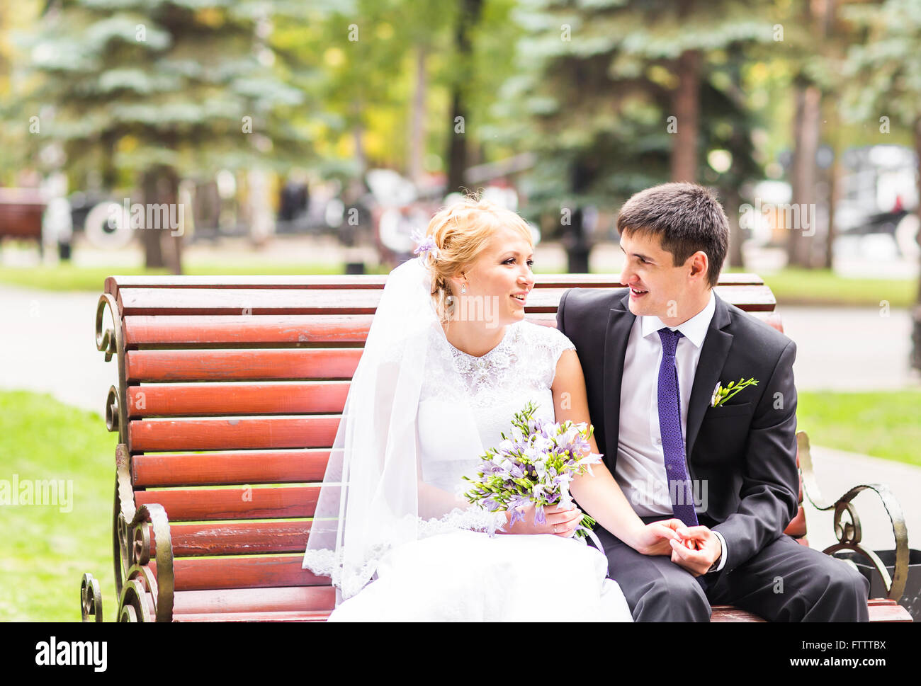 Just married couple embraced Stock Photo - Alamy