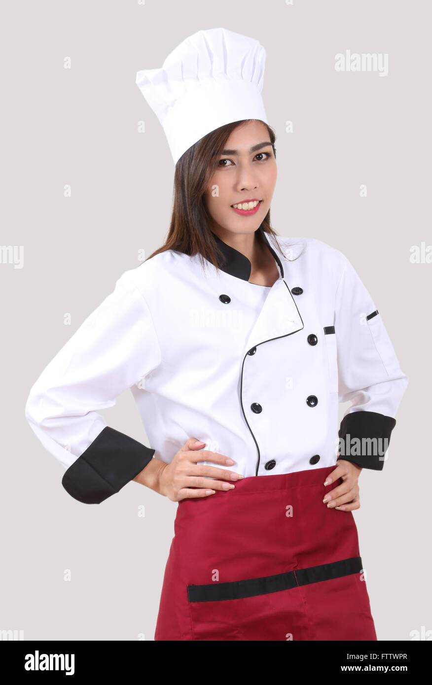 young woman chef in uniform with white hat Stock Photo - Alamy
