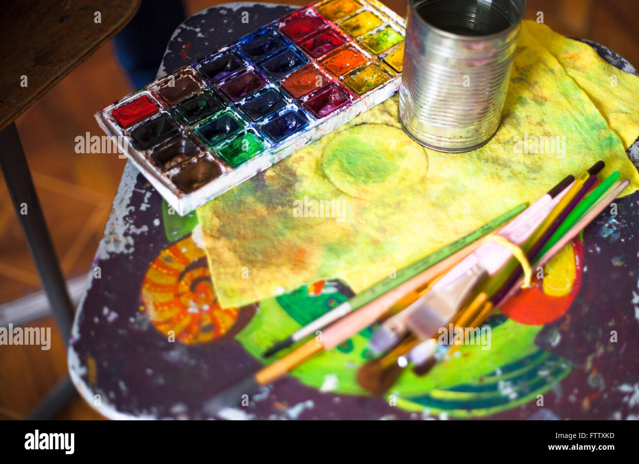 Paints, brushes and other tools in the artist's studio Stock Photo - Alamy