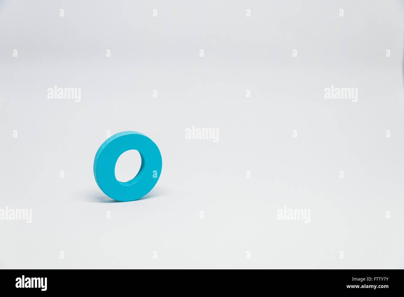 Blue Wooden alphabet O with white background Stock Photo - Alamy