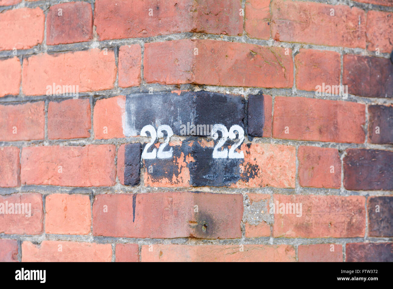 House Number 22 sign painted on corner of wall Stock Photo - Alamy