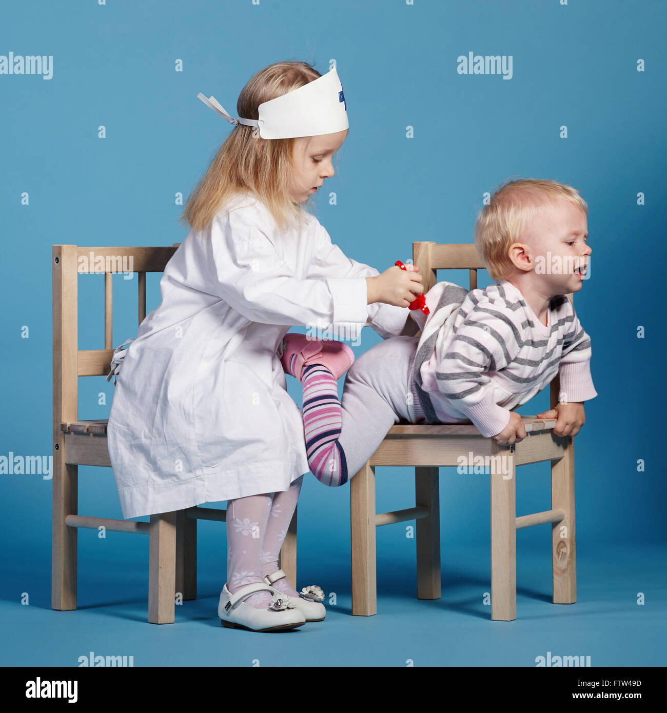 Two girls playing doctor nurse hi-res stock photography and images - Alamy