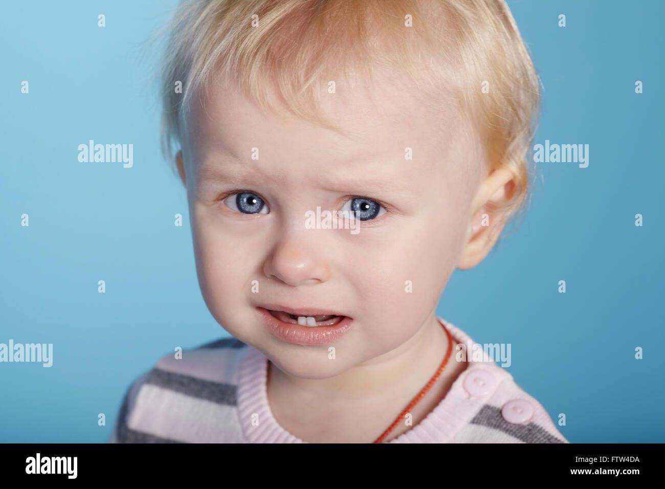 little cute child with tears on face Stock Photo - Alamy