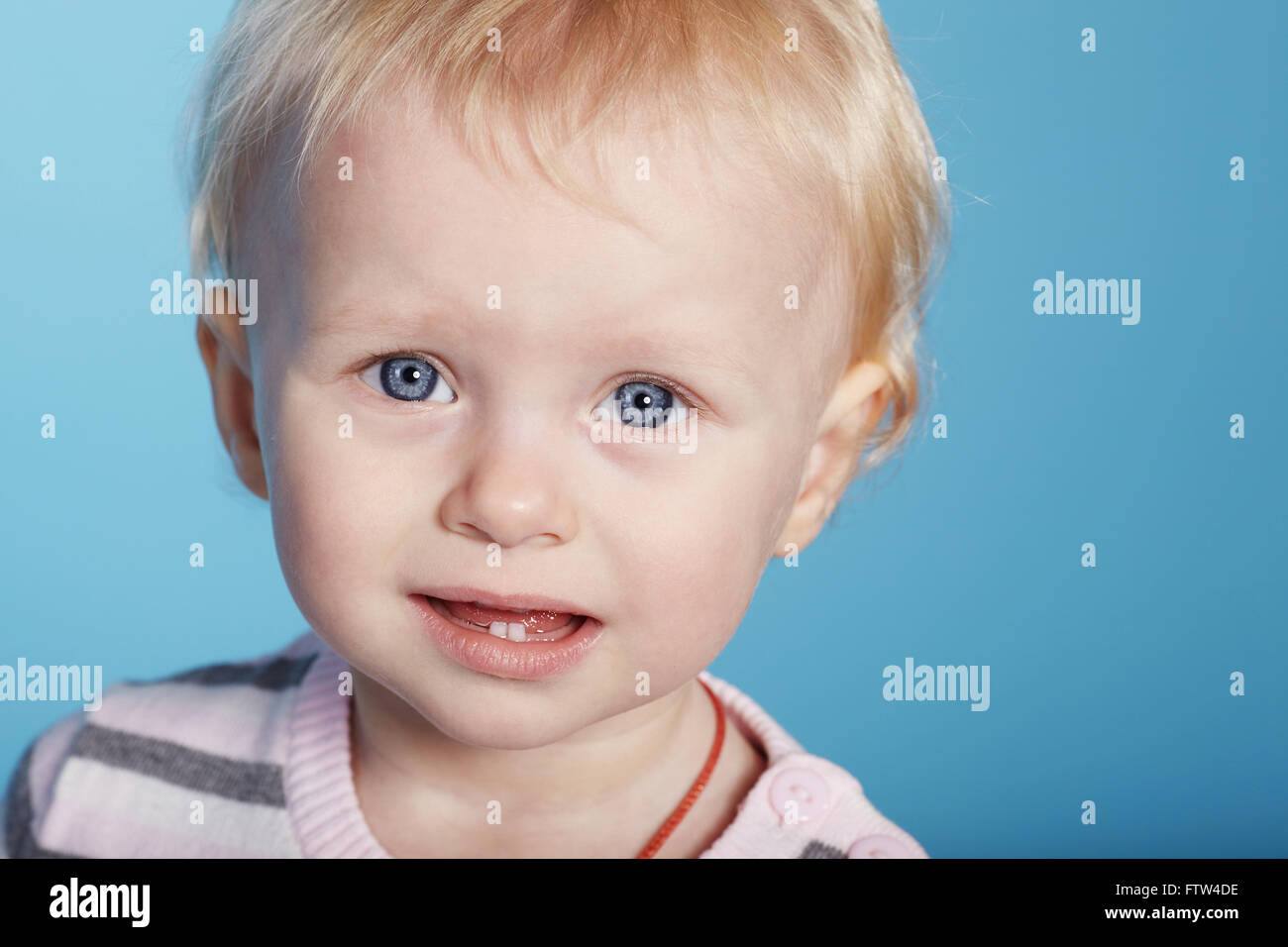 little cute child with tears on face Stock Photo - Alamy