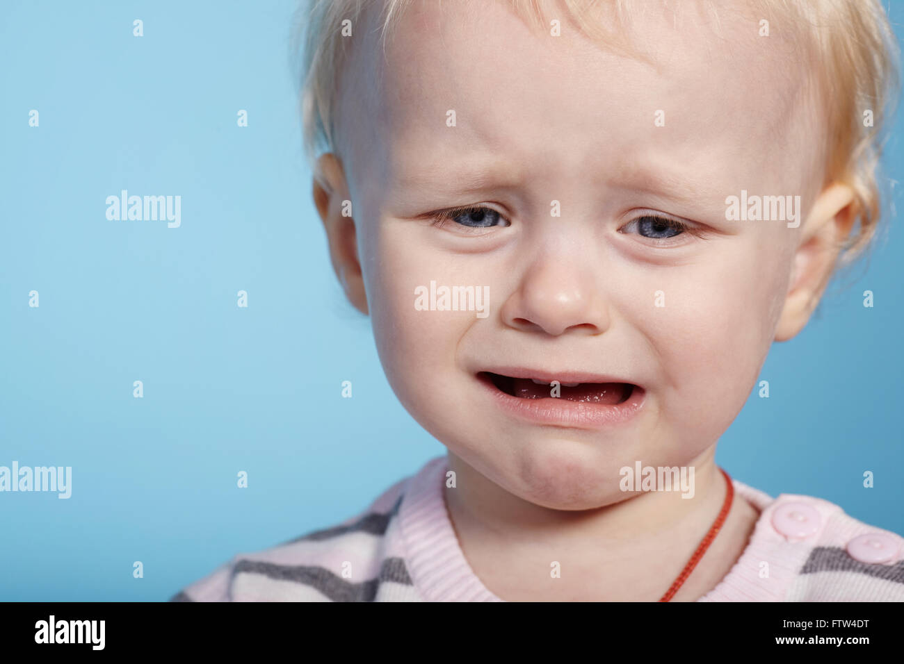 little cute child with tears on face Stock Photo - Alamy