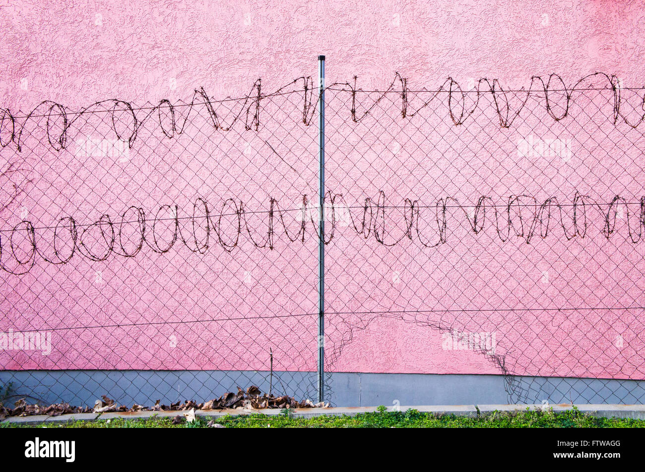 Barbed wire hole in wire hi-res stock photography and images - Alamy