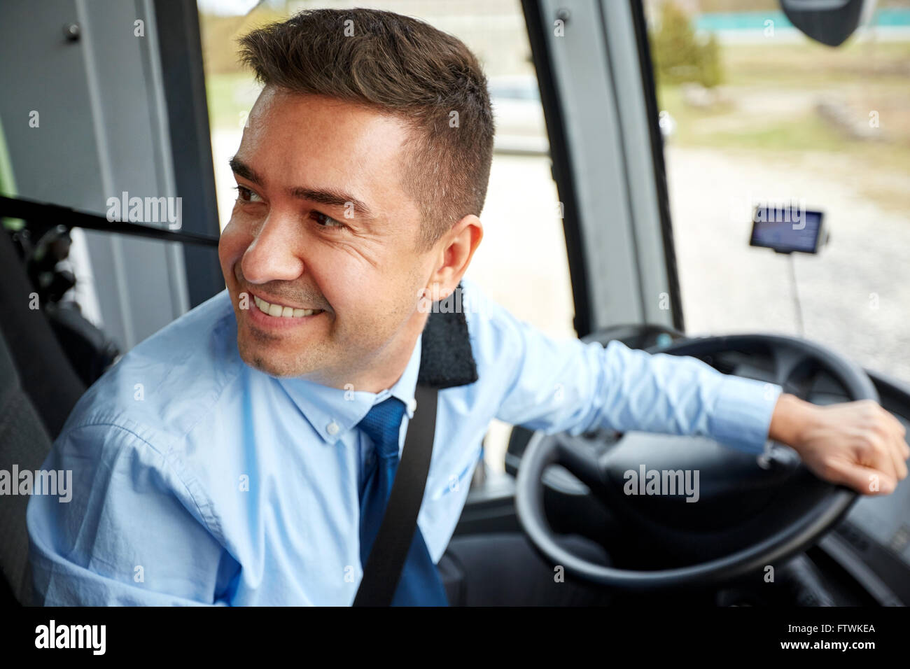 happy driver driving intercity bus Stock Photo - Alamy