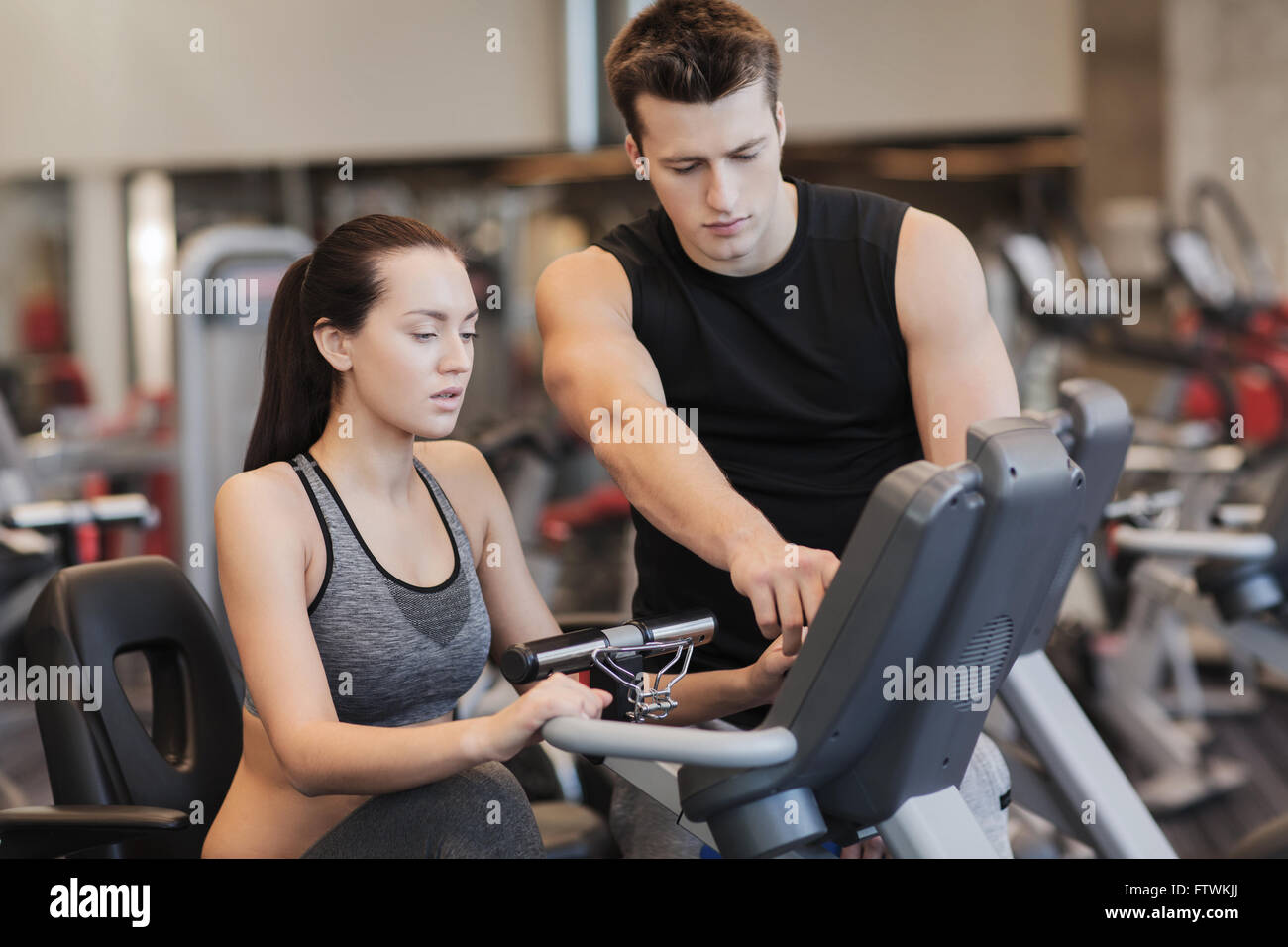 Man setting up exercise machine hi-res stock photography and images - Alamy