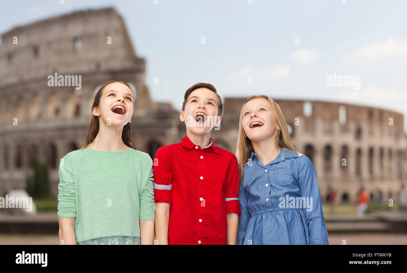 amazed children looking up over coliseum in rome Stock Photo - Alamy