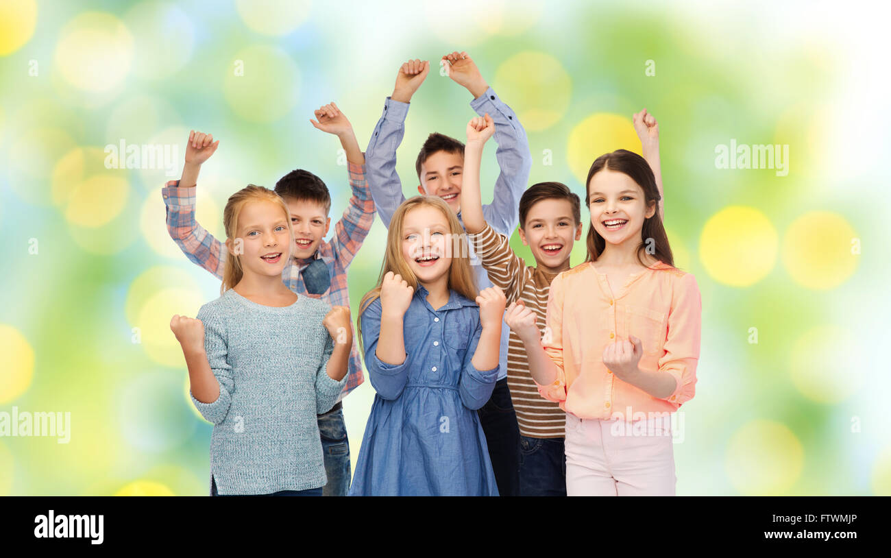 happy children celebrating victory Stock Photo - Alamy