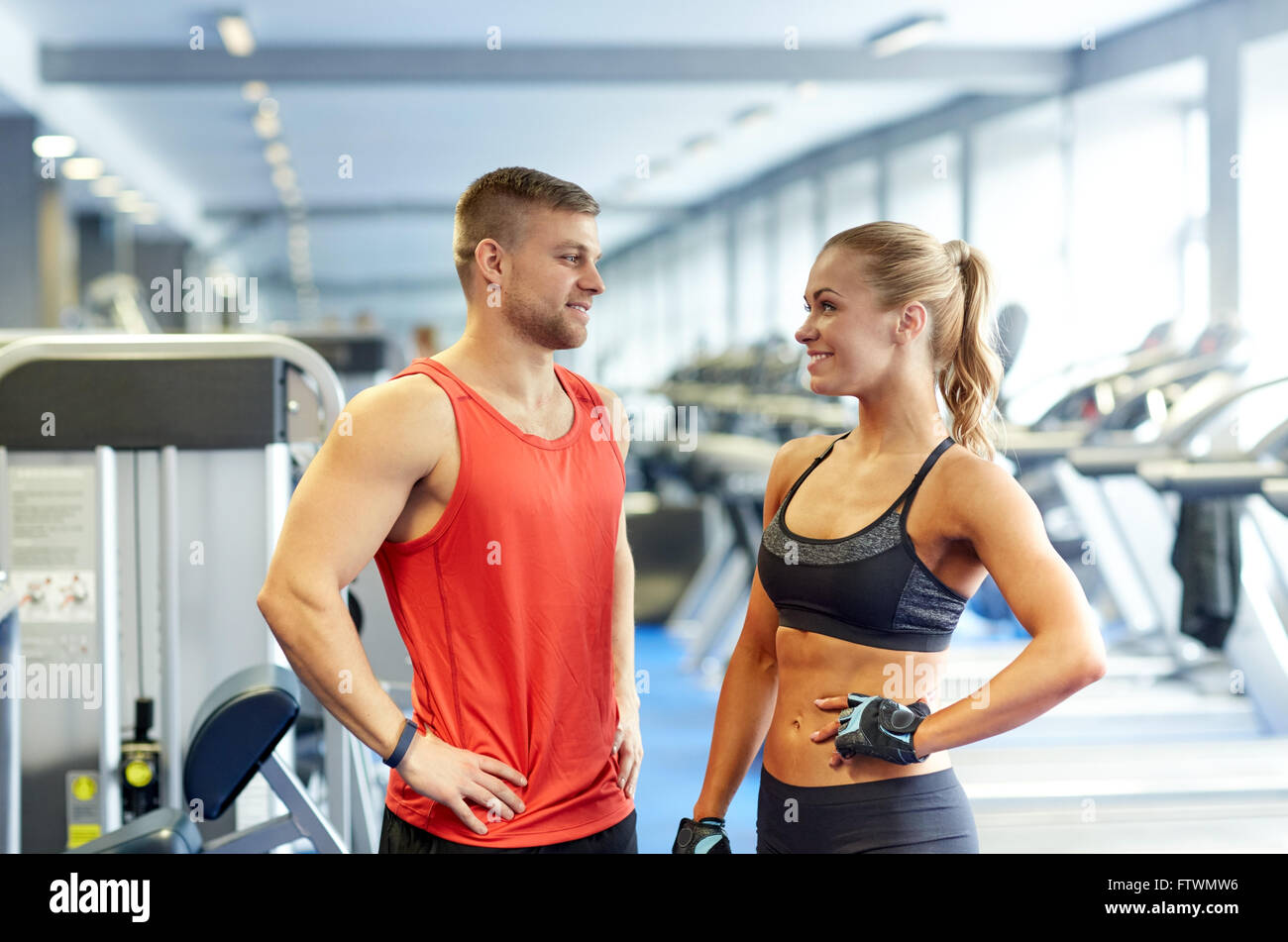 Woman flirting gym instructor hi-res stock photography and images - Alamy