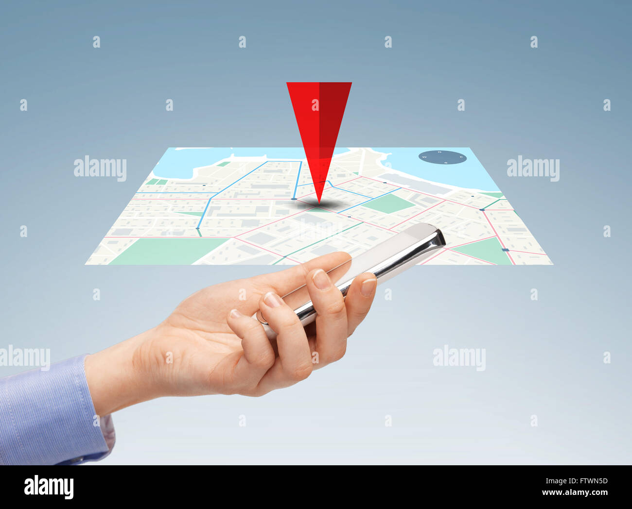 close up of hand with smartphone and navigator map Stock Photo - Alamy